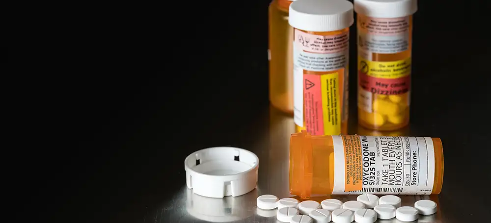 Understanding Opioid Addiction: Scope, Risks, & Management - Mayflower ...